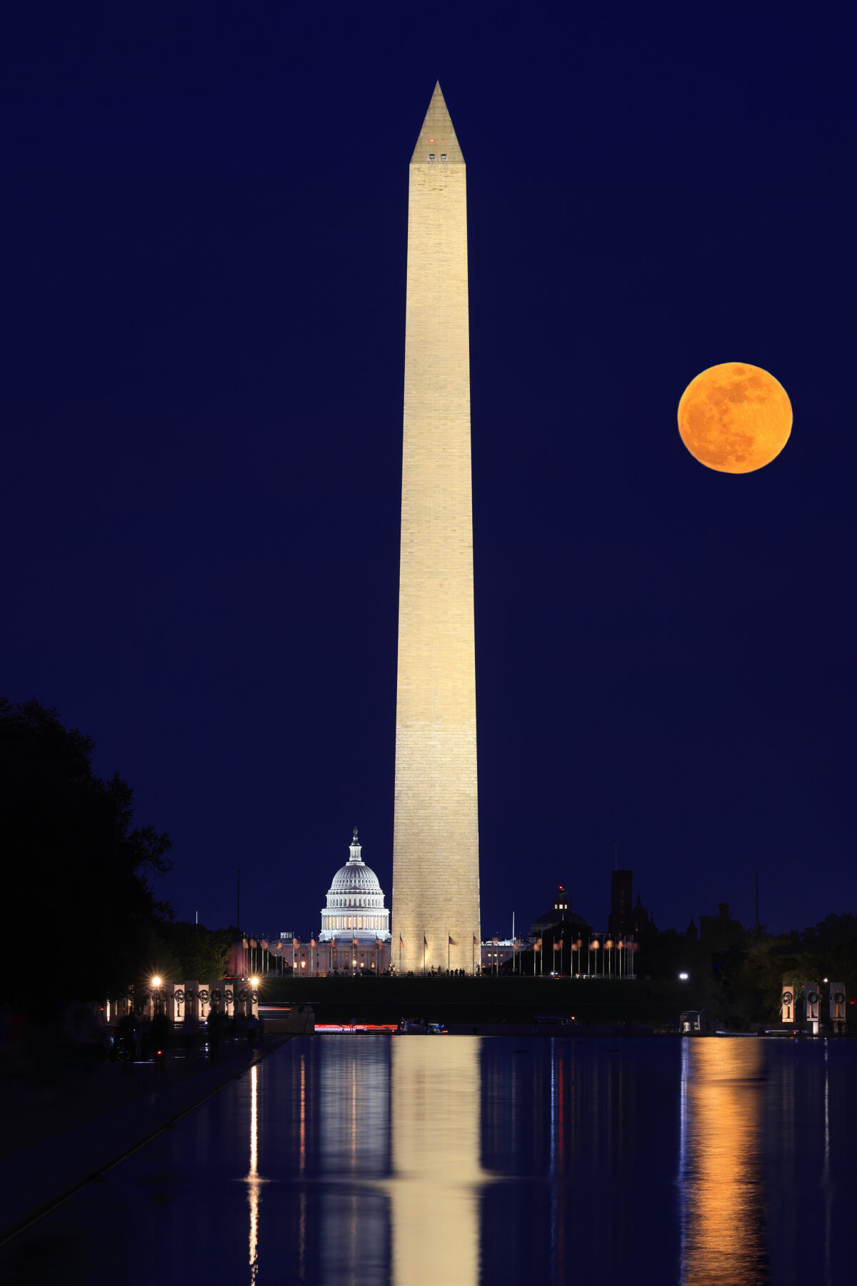Washington DC skyline illuminated at dusk with Washington Monument and ...